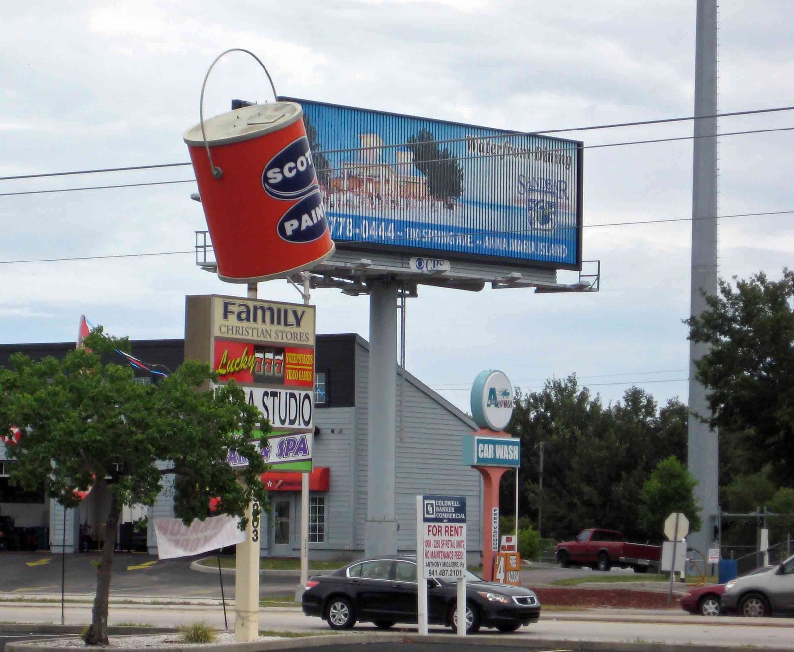 the distinctive scott paint can sign